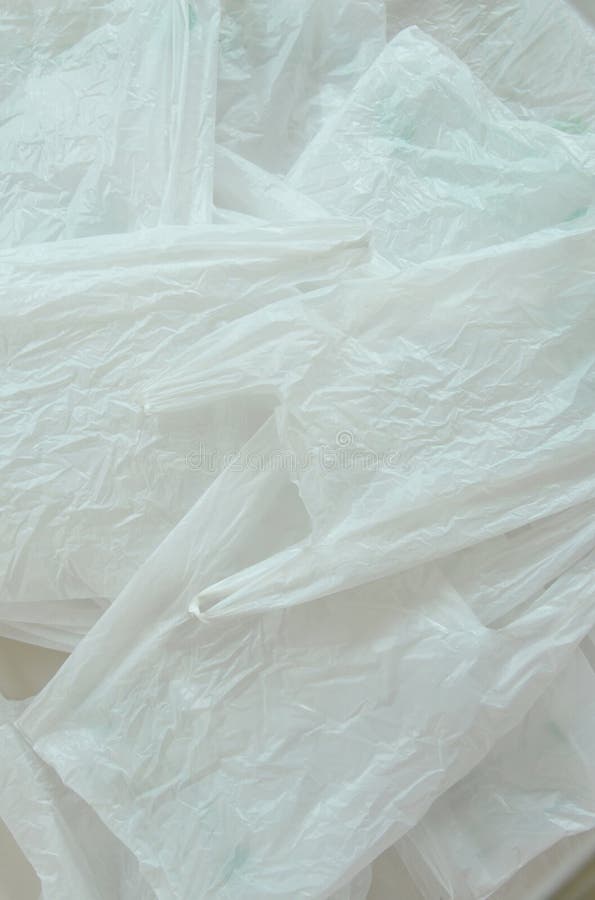White Plastic Bag Packing Stacking on Floor Stock Image - Image of ...