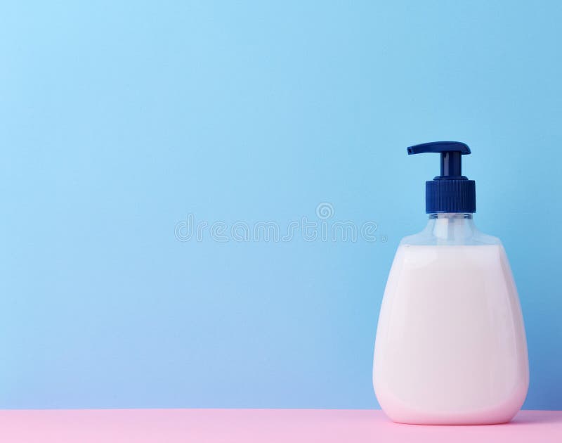 White Plastic Container with a Pump for Cosmetic Liquid Stock Photo ...