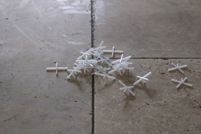 Plastic Crosses on the Floor for Tile Mounting Stock Photo - Image of ...