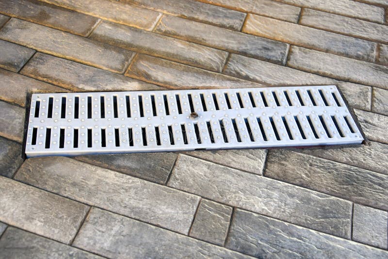White Plastic Drainage Grill for Outdoor Showers. Built into Floor with ...