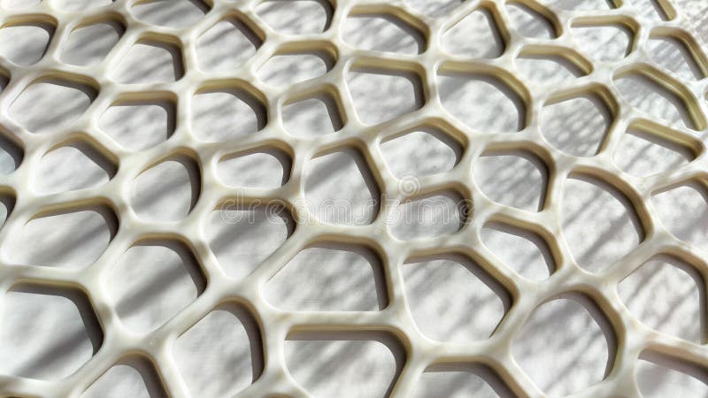 White Plastic Grid Cells Illuminated by the Sun with Shadows. Abstract ...