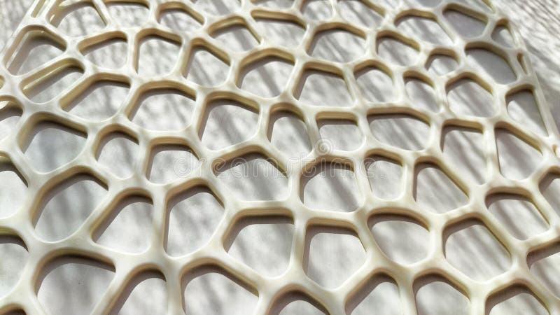 White Plastic Grid Cells Illuminated by the Sun with Shadows. Abstract ...