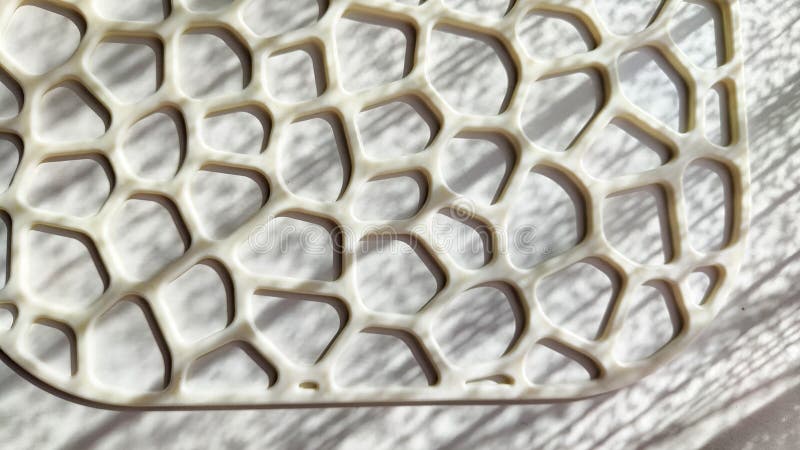 White Plastic Grid Cells Illuminated by the Sun with Shadows. Abstract ...