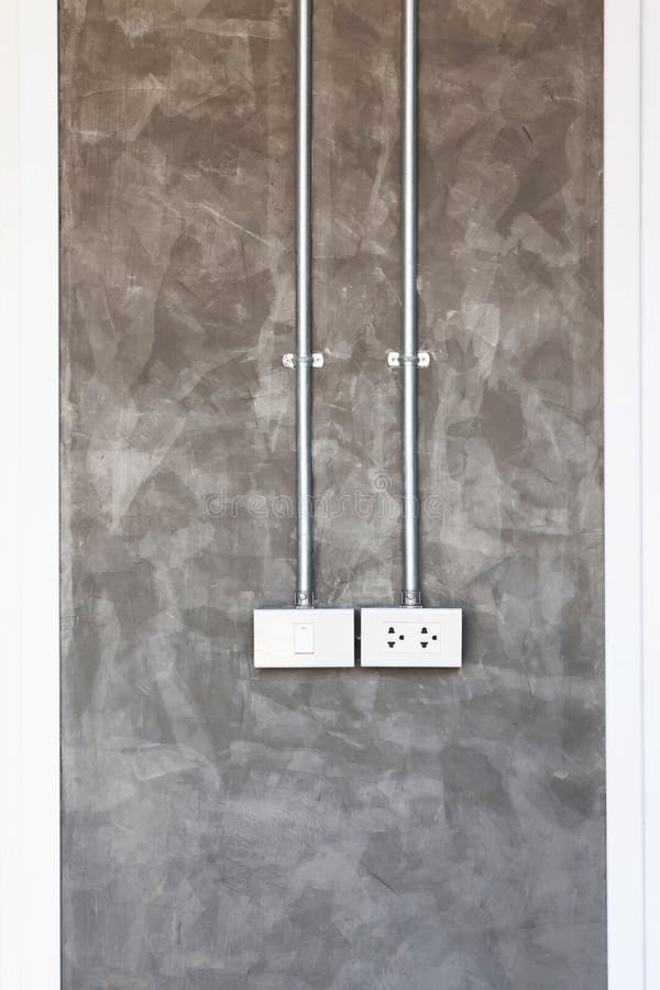 White Plastic Light Switch Turned on and White 2 Power Sockets on ...