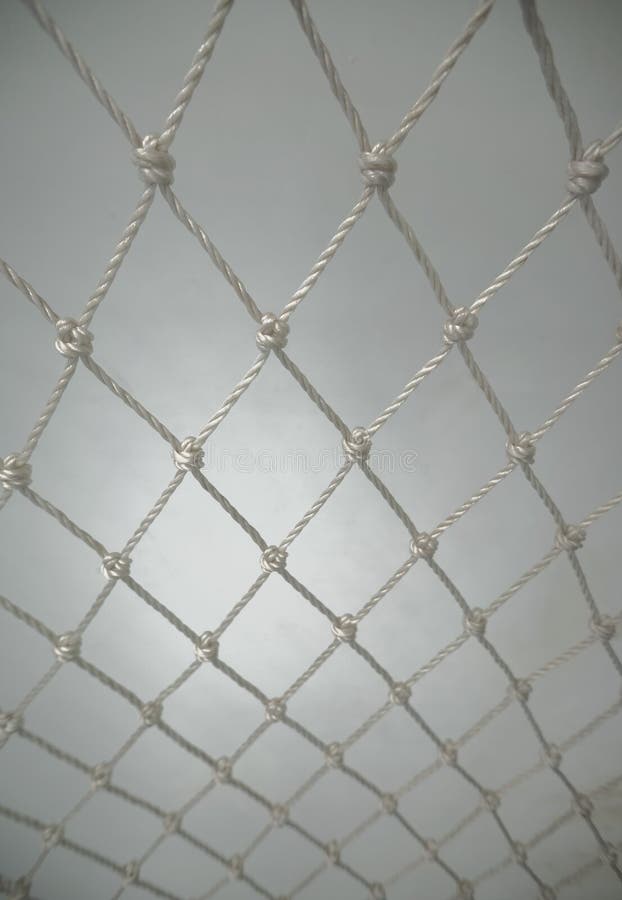White Plastic Nylon Net from Rope on White Background. Polypropylene ...
