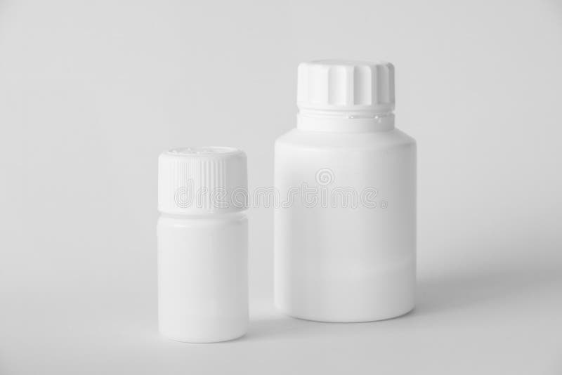 White Plastic Pill Bottles stock image. Image of medical - 181080601