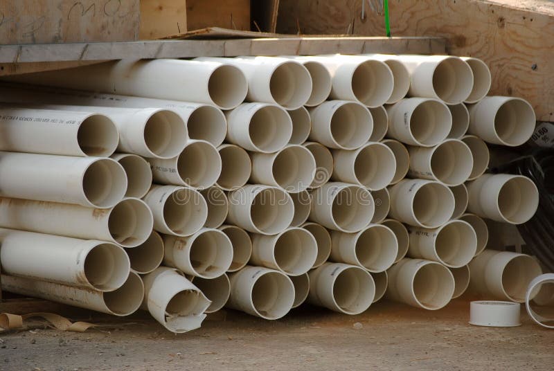 White Plastic Pipes stock photo. Image of piled, pipe - 21371206