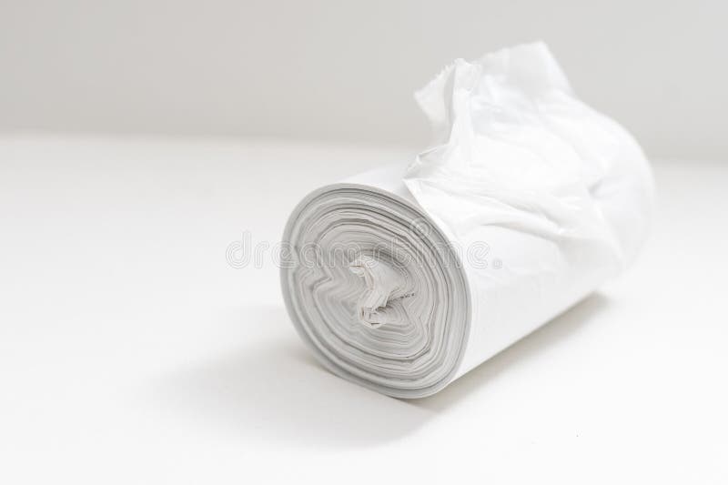 White Plastic Polyethylene Trash Bag Roll Isolated Over the White ...
