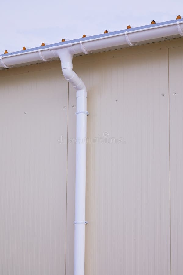 White Plastic Rain Guttering System. Guttering Drainage Pipe Exterior ...