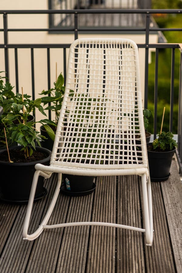 White Plastic Rocking Chair on a Roof Terrace.. Stock Photo - Image of ...