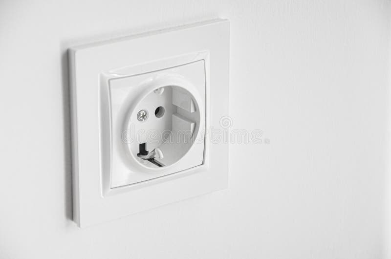 The White Plastic Socket is Mounted in a White Wall Stock Image - Image ...
