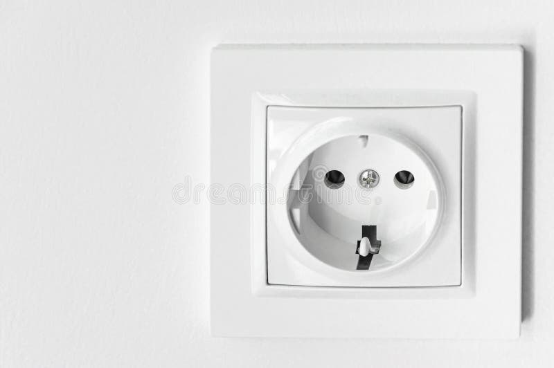 The White Plastic Socket is Mounted in a White Wall Stock Image - Image ...