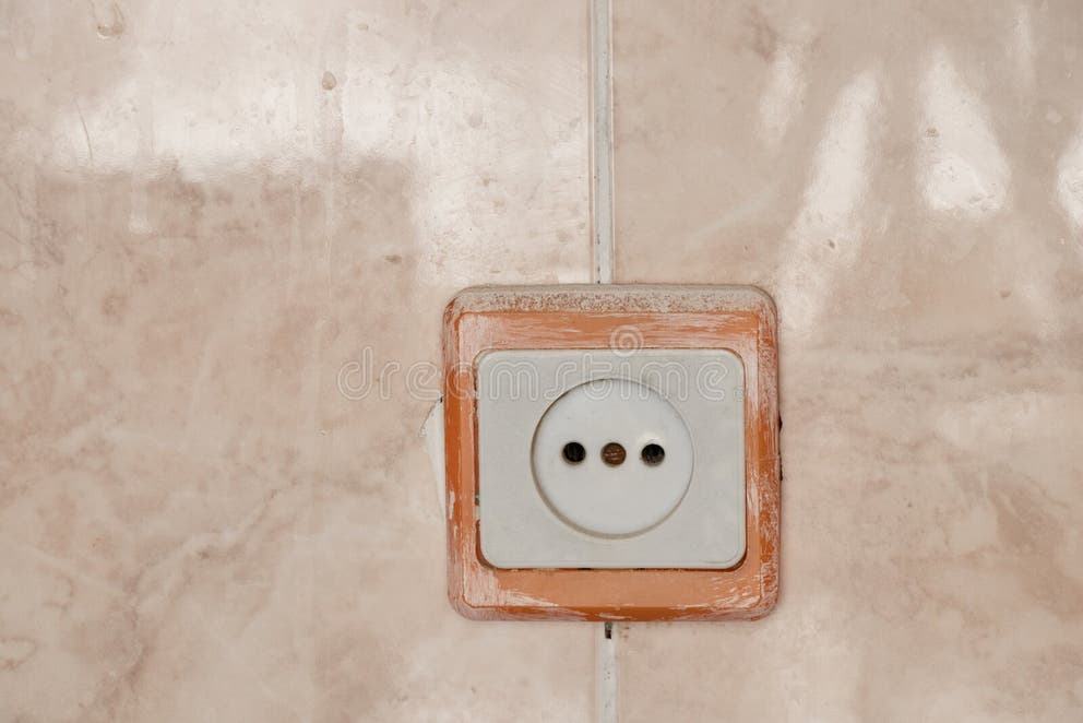 White Plastic Socket on the Wall on the Tiles in the Kitchen Stock ...