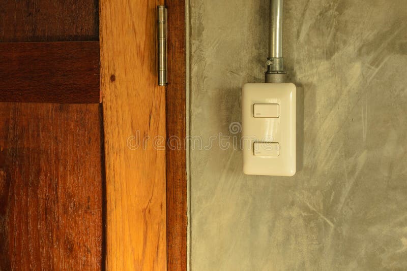 White Plastic Switch Panel is on Loft Style Wall Stock Image - Image of ...