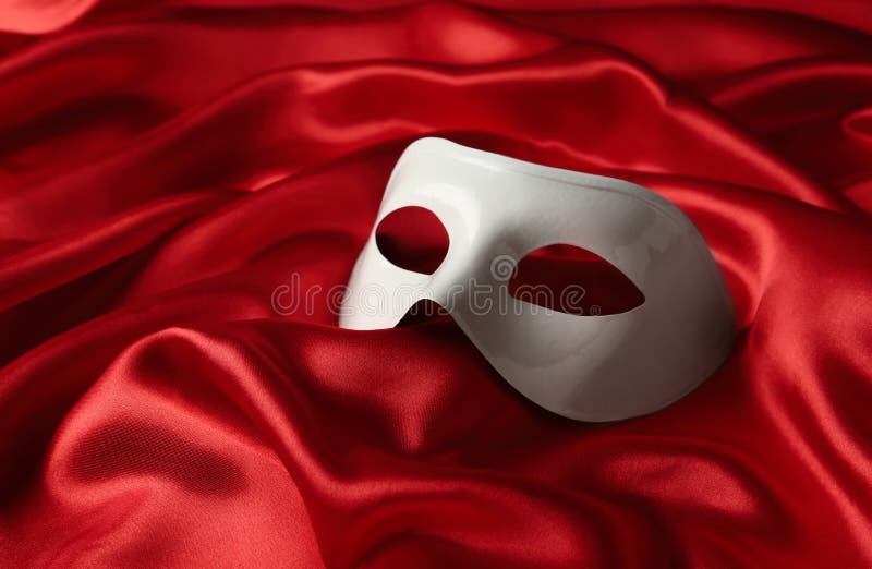 White Plastic Theatre Mask on Red Fabric Stock Image - Image of event ...