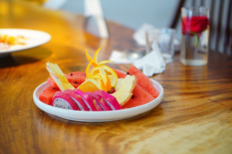 White Plate Filled with Assorted Tropical Fruits Stock Photo - Image of ...