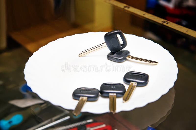 White Plate with Five Blank Car Keys Stock Photo - Image of shiny, hand ...