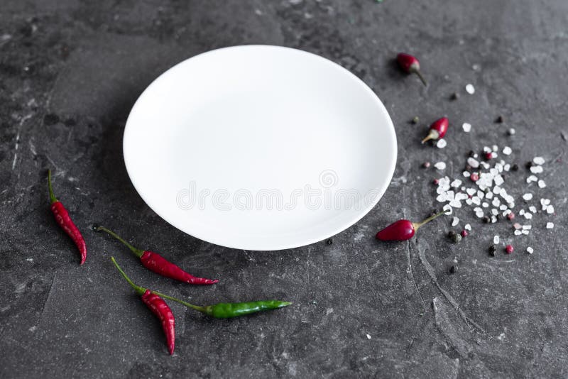 White Plate on a Gray Concrete Background. Preparation for Cooking ...