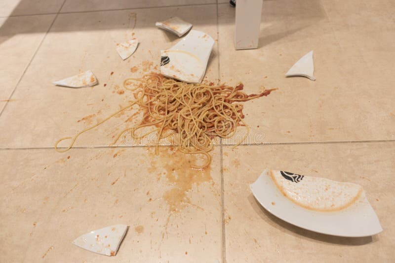 White Plate with Pasta Broken on Ceramic Floor in the Kitchen, Domestic ...
