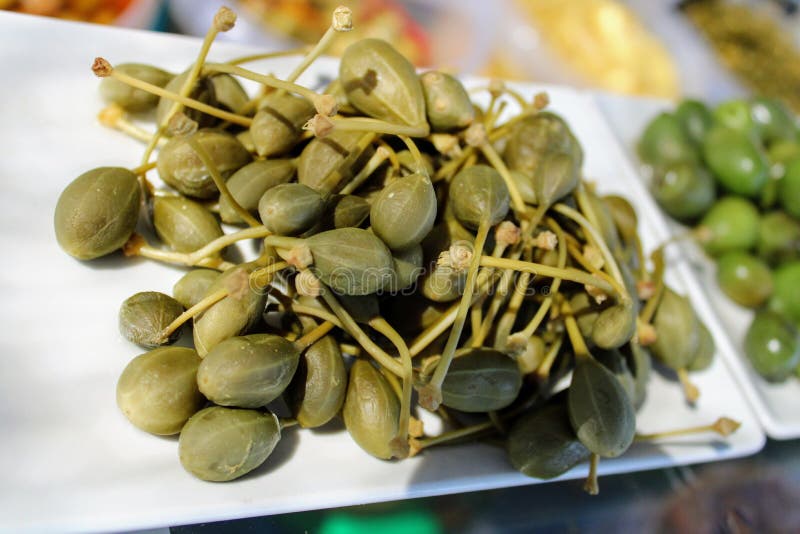 White Plate with Pickled Green Capers Stock Image - Image of closeup ...