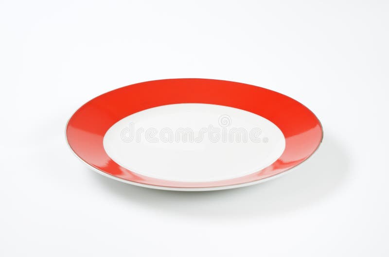 White plate with red rim stock photo. Image of ceramic - 86297540