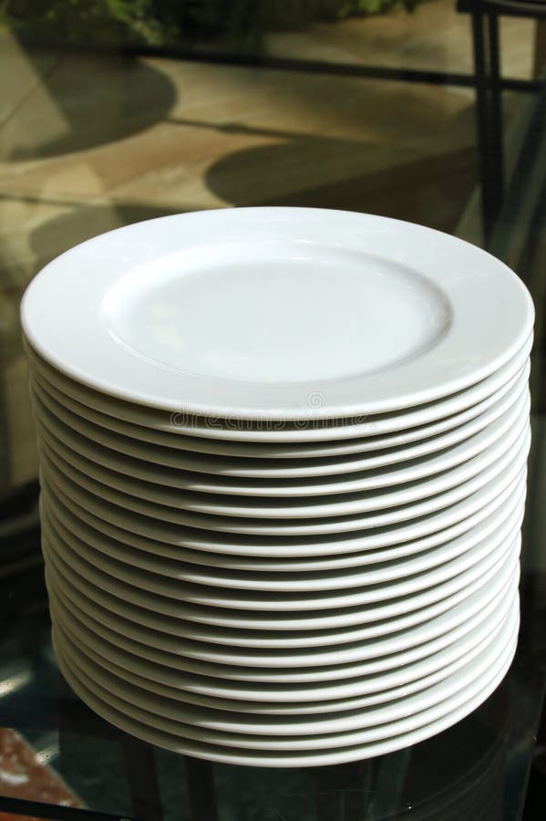 White plates stock image. Image of plate, saucers, utensil - 5176069