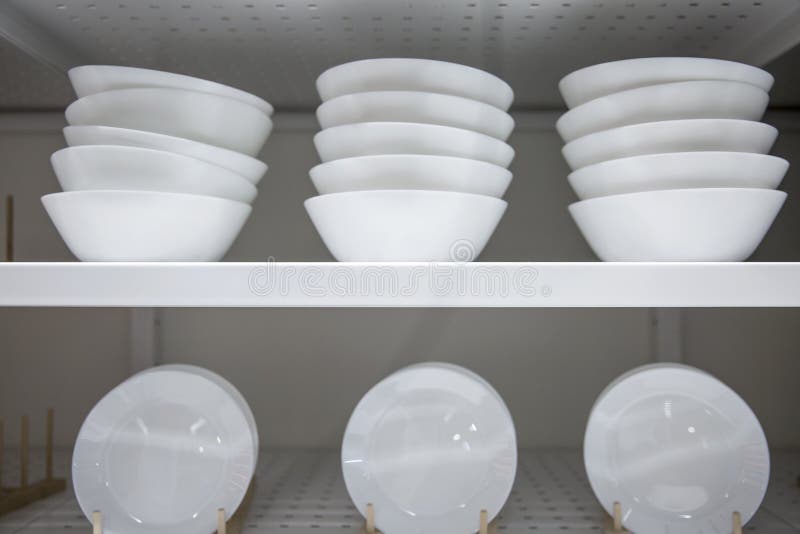 White Plates on Open Shelves in the Kitchen. Organization of Space ...