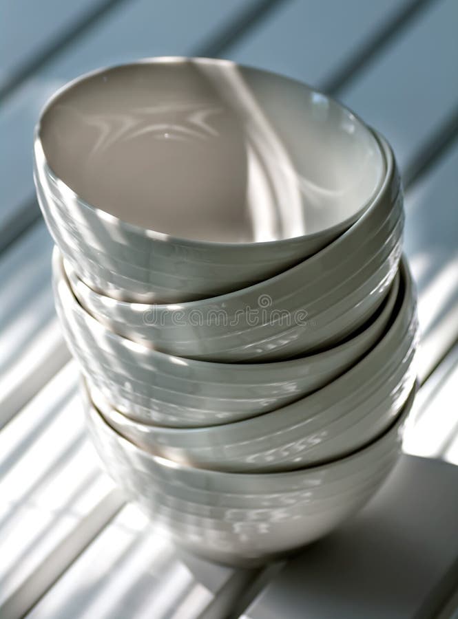 White plates are stacked stock image. Image of table - 34039547