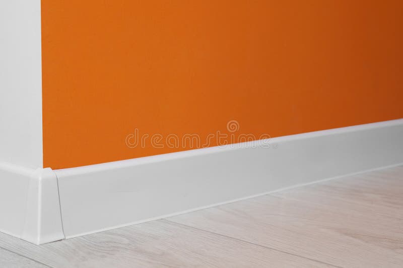 White Plinth on Laminated Floor Near Black Wall Indoors Stock Photo ...