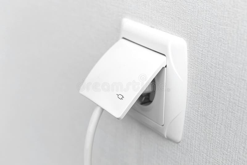 White Plug into Electric Socket, Modern Interior Photo Stock Photo ...