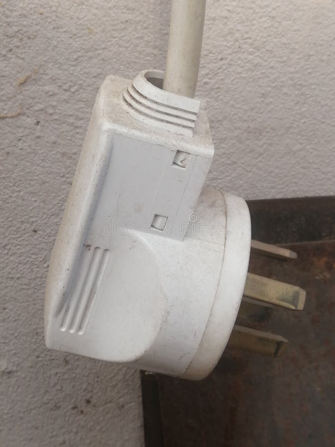White Plug for Hanging on a White Cable Stock Image - Image of white ...