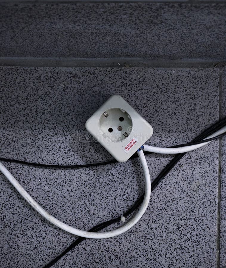 White Plug for Hanging on a White Cable Stock Image - Image of white ...