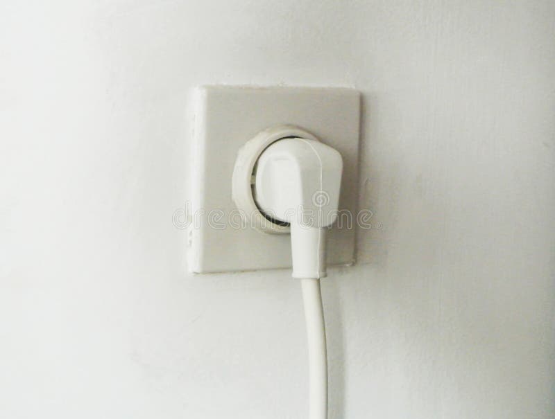 White plug in wall socket stock photo. Image of plug - 152406930