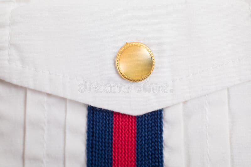 White Pocket with Gold Color Button Stock Photo - Image of grid, colour ...