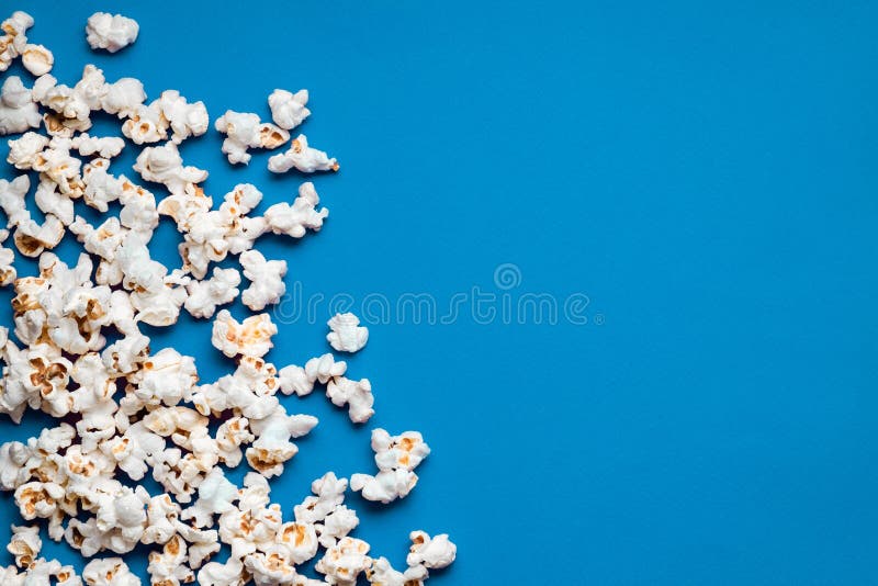 Popcorn on a Blue Background Stock Image - Image of close, eating ...