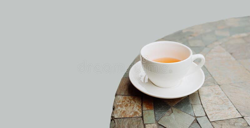 White Porcelain Tea Cup on a Round Table, Isolated, Selective Focus ...