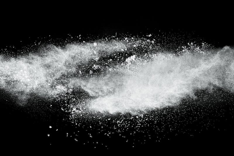 White Powder Explosion Isolated on Black Background. White Dust ...
