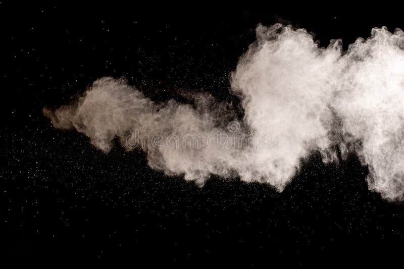 White Powder Explosion Isolated on Black Background.White Dust ...