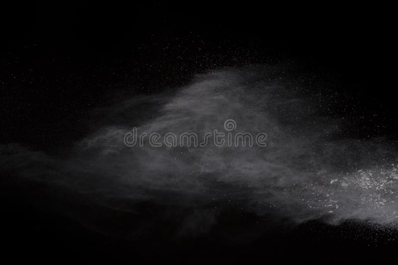 Freeze Motion of White Color Powder Exploding on Black Background ...
