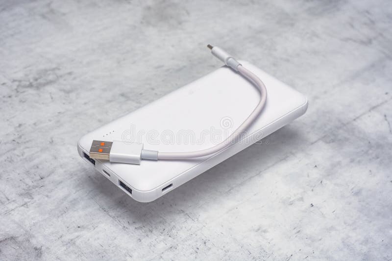 White Power Bank on a Marble Table. Portable Charger for Gadgets Stock ...