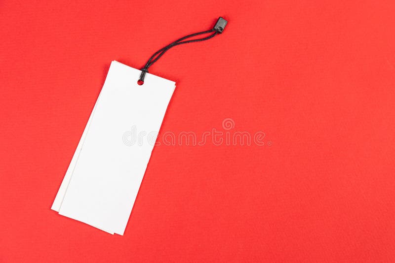 White Price Tag on a Red Isolated Background, Price Tag for Goods Stock ...