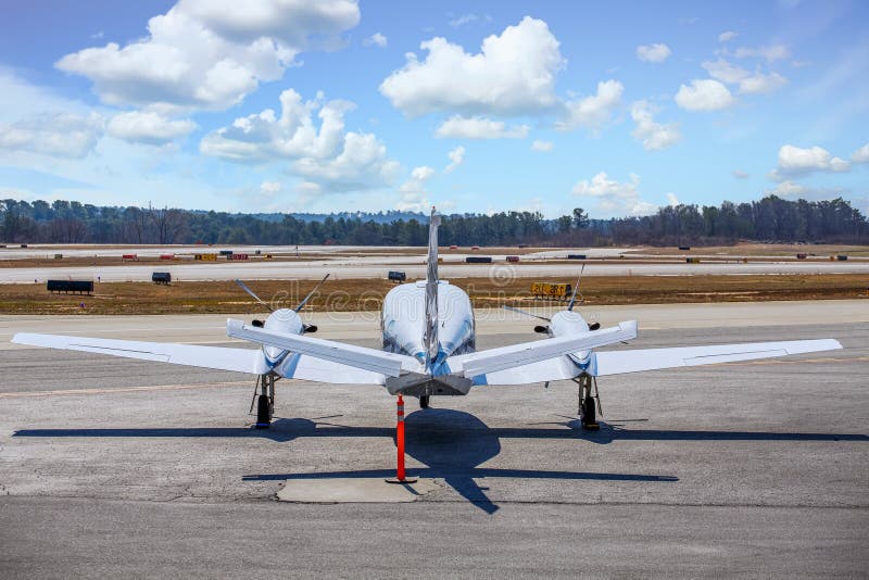Red and White Plane on Runway Stock Photo - Image of wings, aeroplane ...