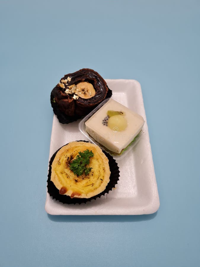 White Pudding, Egg Rolls, Chocolate Filled with Bananas Stock Photo ...