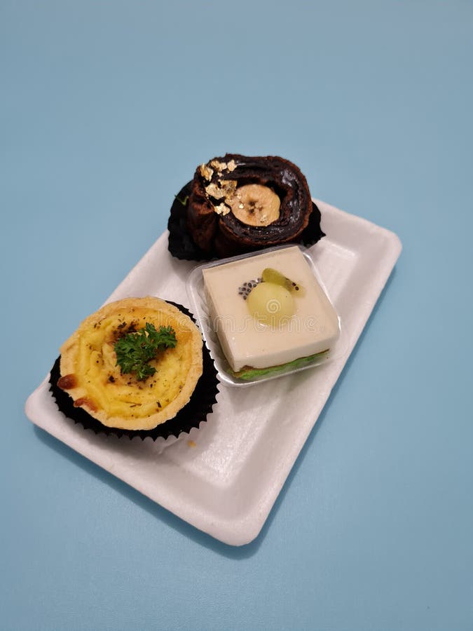 White Pudding, Egg Rolls, Chocolate Filled with Bananas Stock Image ...