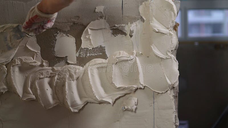White Putty on the Wall. before Leveling, Plaster the Wall with Large ...