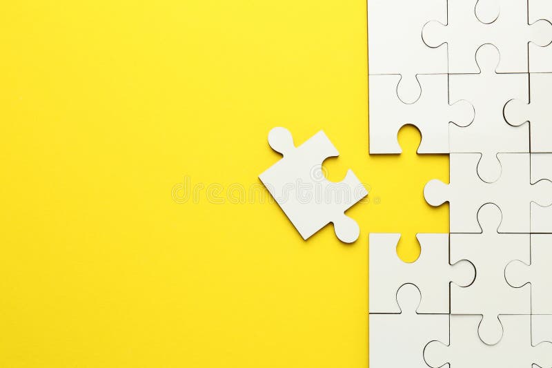 White Puzzle Pieces on Yellow Background, Top View. Space for Text ...