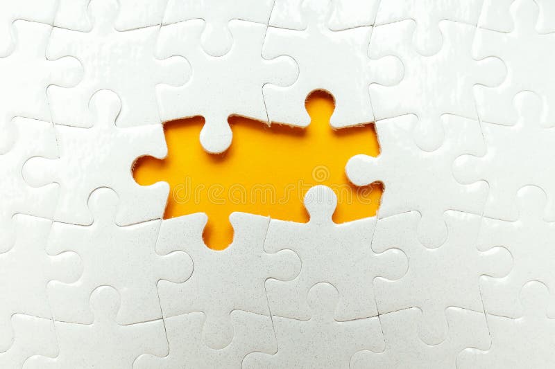 White Puzzles without Two Puzzles on Orange Background Stock ...