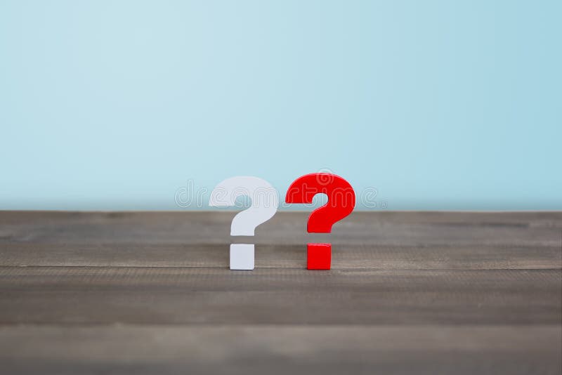 White Question Mark and Red Question Mark on Wood Table Stock Image ...