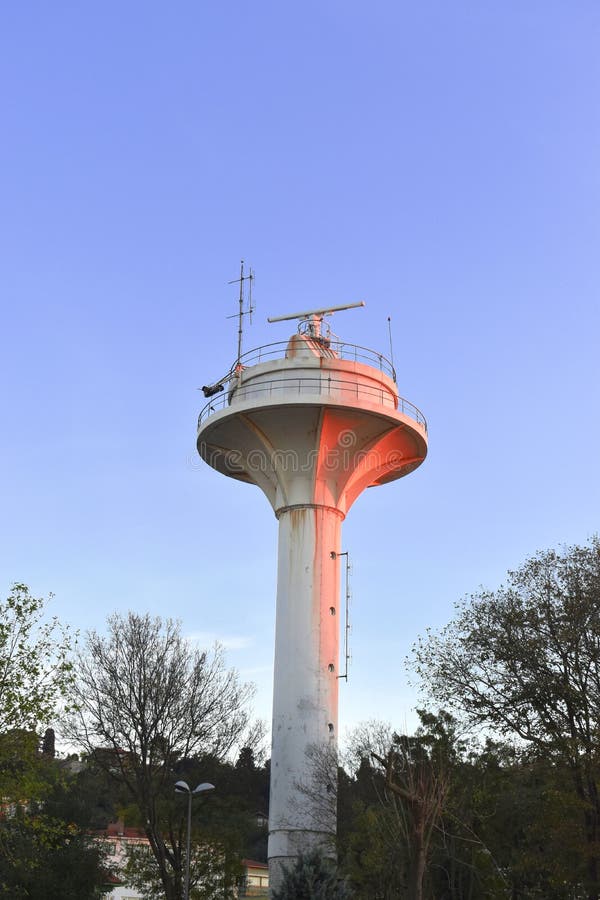White and red radar tower stock photo. Image of building - 179894298