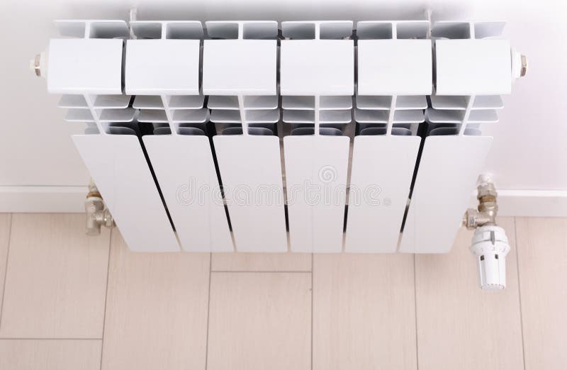 White Radiator In An Apartment. Radiator. Stock Image - Image of ...